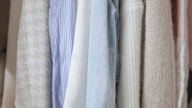 Organizing Fresh Spring Wardrobe with Vibrant and Pastel Clothing on ...