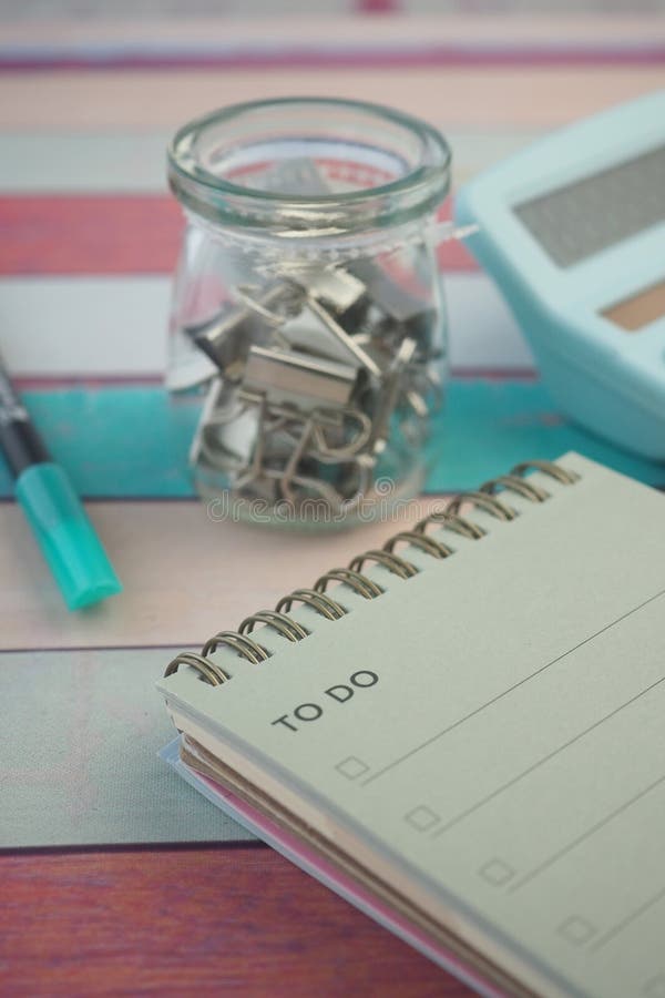 Organizing Tasks with a To-do List and Stationery Essentials Stock ...
