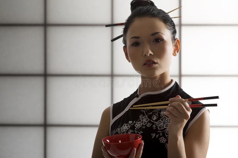 Oriental Girl with Chopstick Stock Photo - Image of cuisine, japanese ...