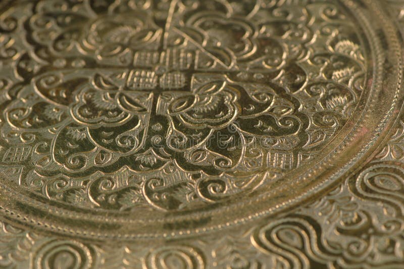 Oriental patterns on metal stock image. Image of brass - 135203627