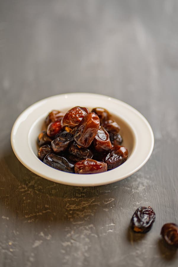 Oriental Sweetness - Royal Dates in a White Cup, Stock Image - Image of ...