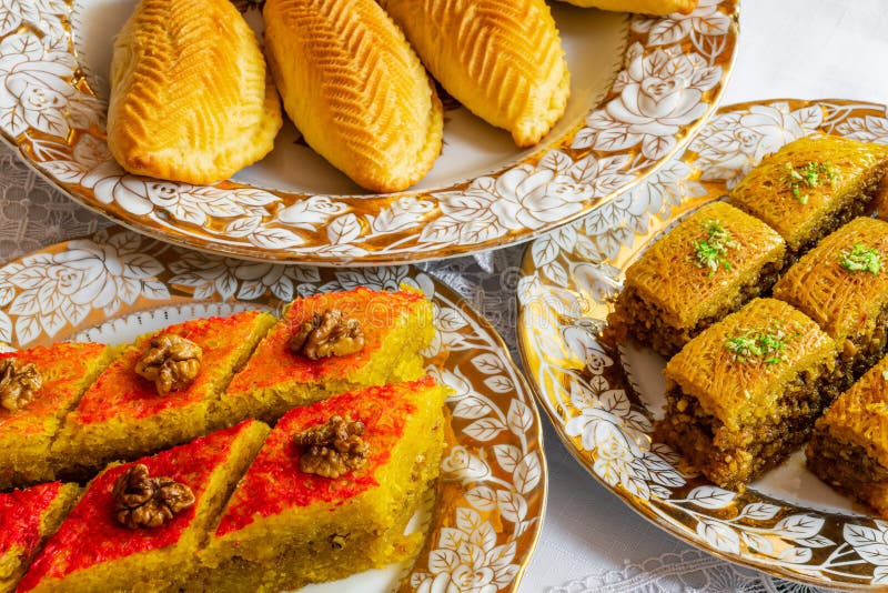 Oriental sweets on a plate stock photo. Image of food - 256350778