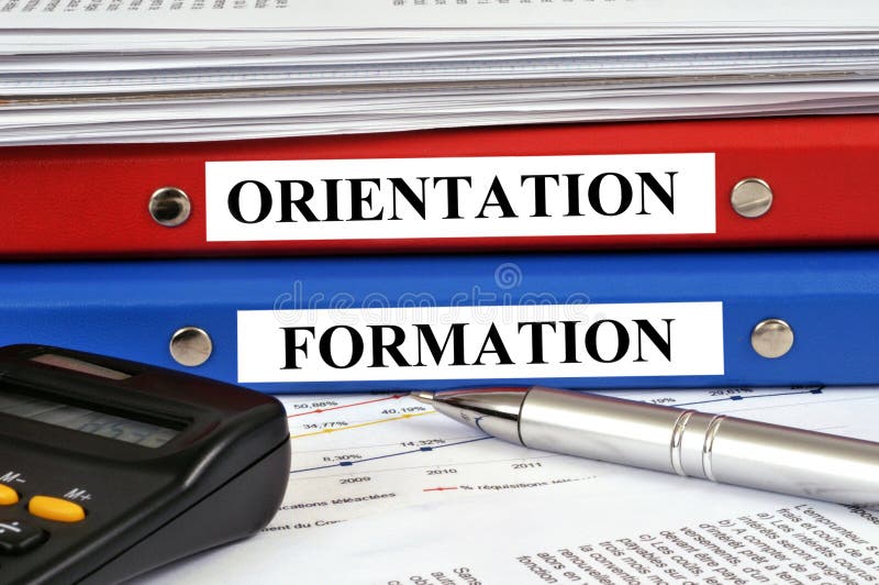 Orientation and Training Folders Stacked on a Desk Stock Image - Image ...