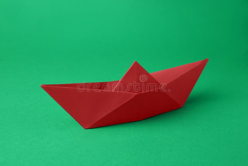 Origami Art. Red Paper Boat on Green Background Stock Image - Image of ...