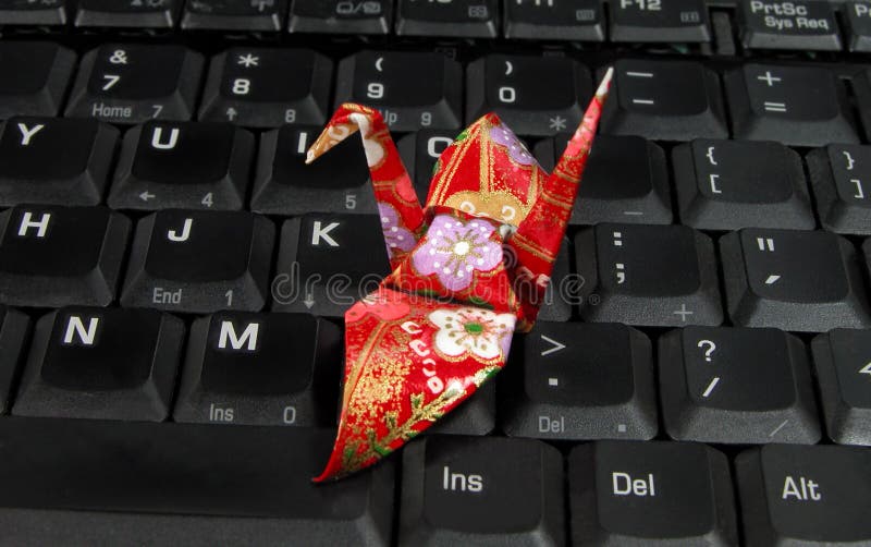 Origami on a Laptop Keyboard Stock Image - Image of keys, culture: 597805