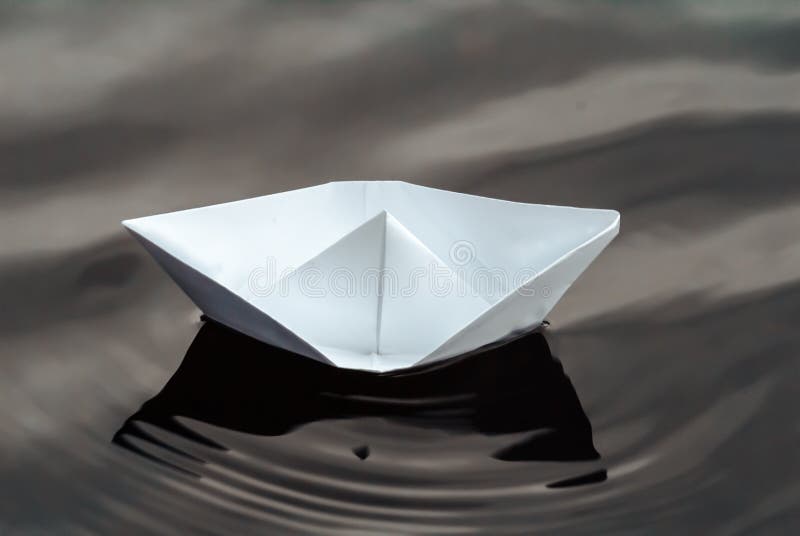 Paper Boat Sailing on Water with Waves and Ripples Stock Image - Image ...