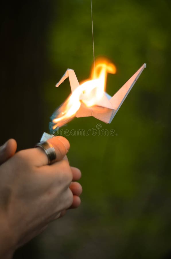 Origami stock image. Image of fire, summer, burning, hand - 42861109