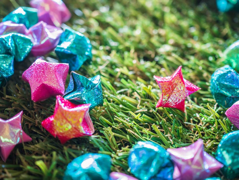 Origami Star on Green Grass Stock Photo - Image of pink, stars: 106491478