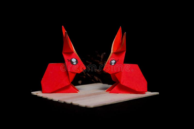 Origami of Two Red Rabbit on Ice Cream Stick Stock Photo - Image of ...