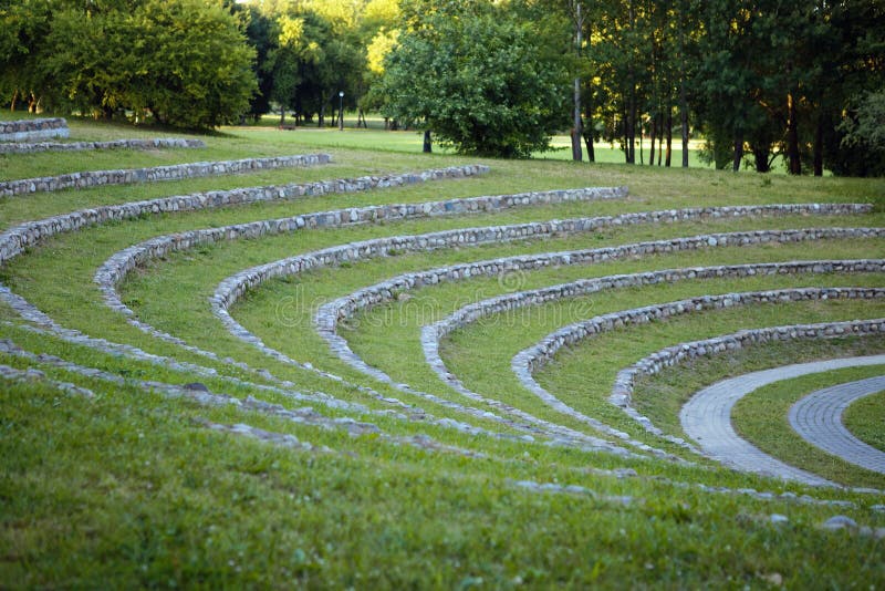 Original Amphitheater of Grass and Stones in the Park Stock Photo ...