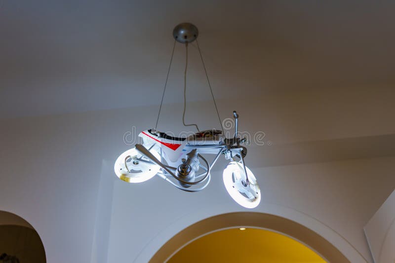 Original Ceiling Lamp in the Form of a Motorcycle. Stock Image - Image ...