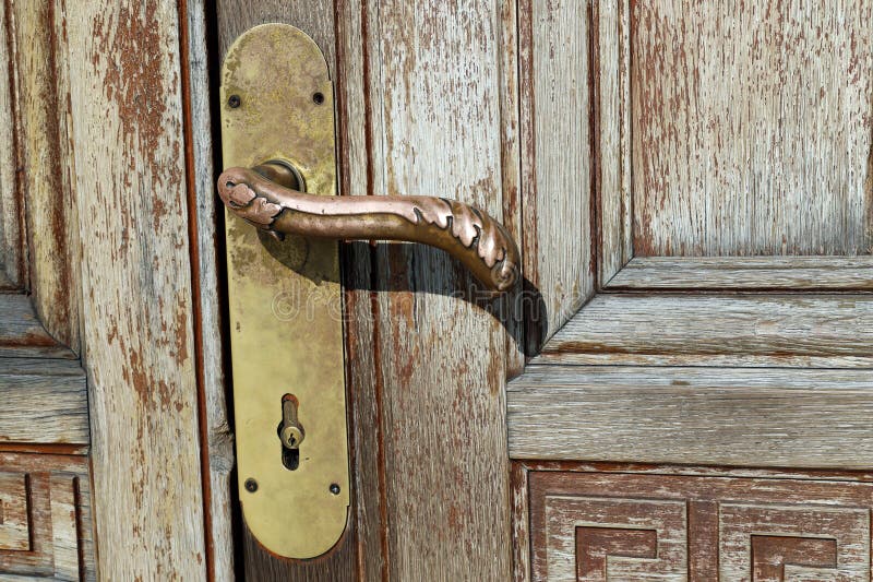 Original Copper Handle on an Old Wooden Door Stock Photo - Image of ...