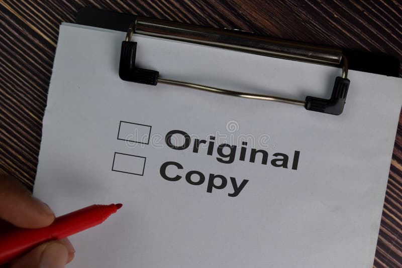 Original and Copy Write on a Paperwork. Supported by an Additional ...