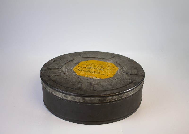 An Old Film Can with an Orange Label. Stock Photo - Image of 35mm ...