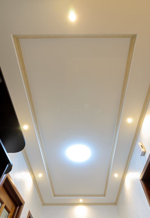 Original Stylish Multi-level Ceiling in the Hallway of the Apartment ...