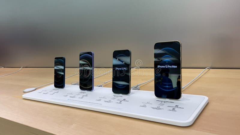 A Row of All of the Models of the IPhone 12 at an Apple Store Editorial ...