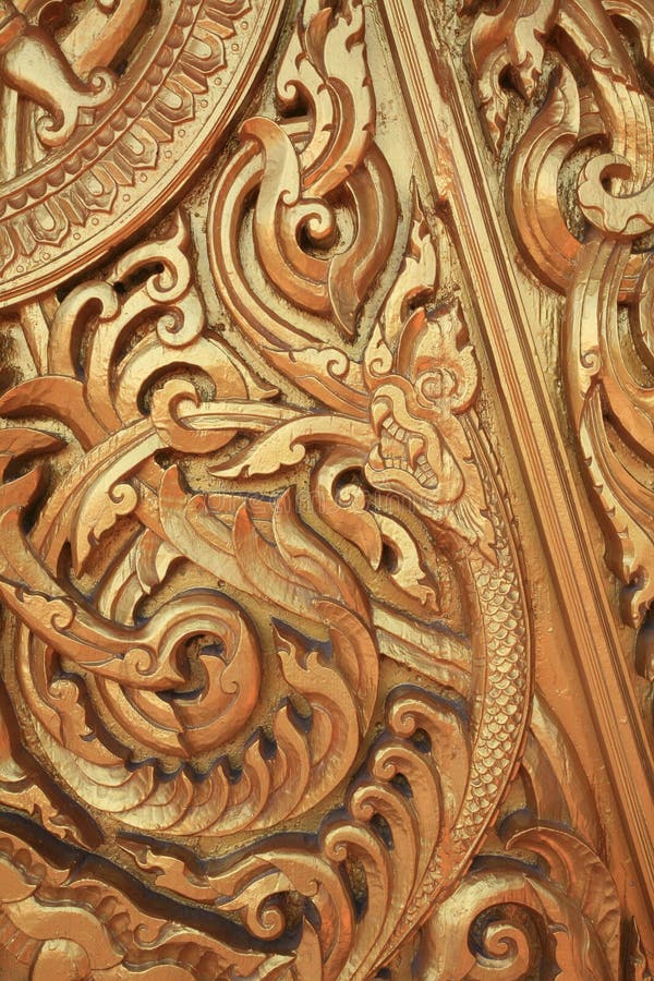 Ornament: Gold Sculpture of Naga and Fire Stock Image - Image of metal ...