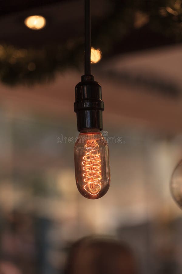 Ornamental light bulb lit stock photo. Image of knowledge - 64415738