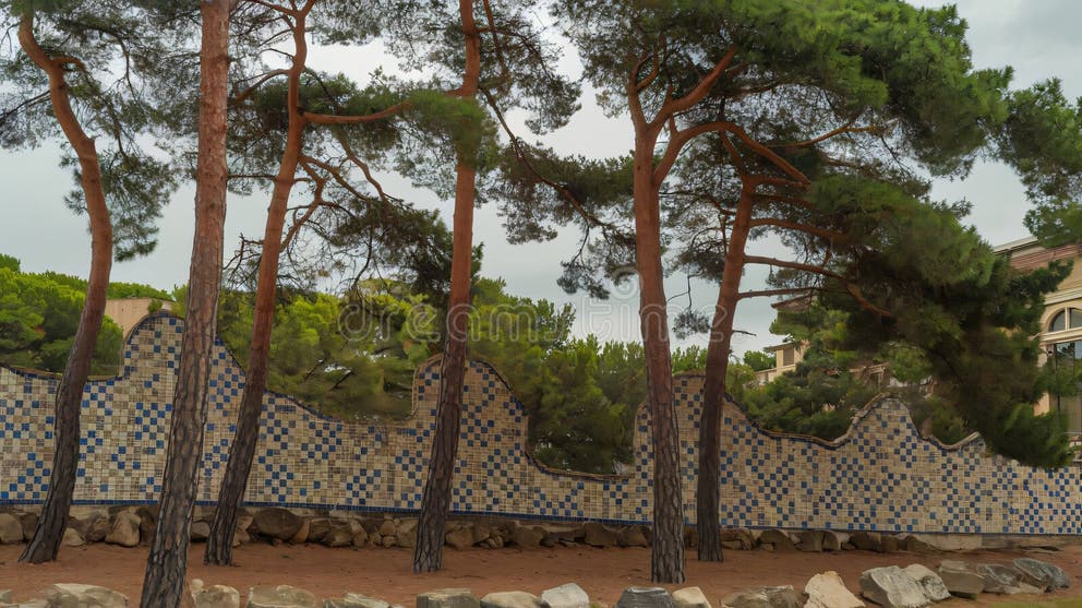 Ornamental Tile Wall with Pine Trees in a Park High Quality Image Stock ...