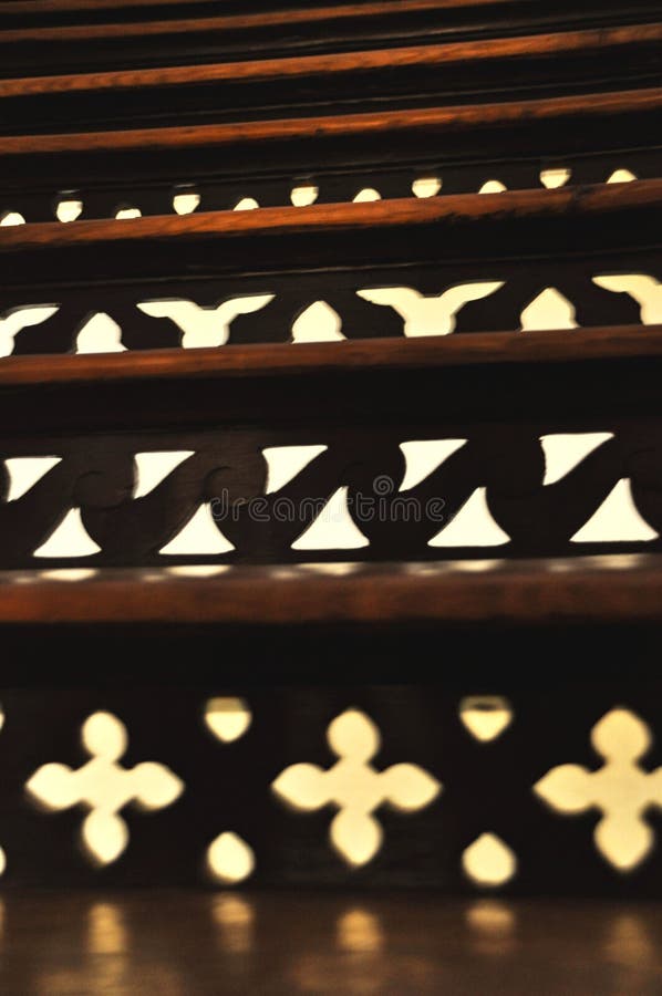Ornamental Wooden Stairs with Intricate Lace Pattern, Warm Light ... Ornamental Wooden Stairs with Intricate Lace Pattern, Warm Light ...