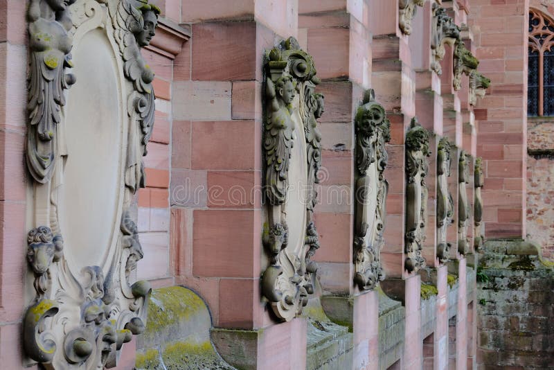 Ornamented Mirror-shaped Carvings with Statues on the Columns of an Old ...