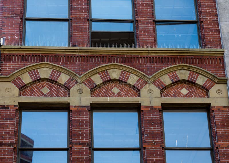 Ornate Brickwork in Former Granary Stock Image - Image of black, ornate ...