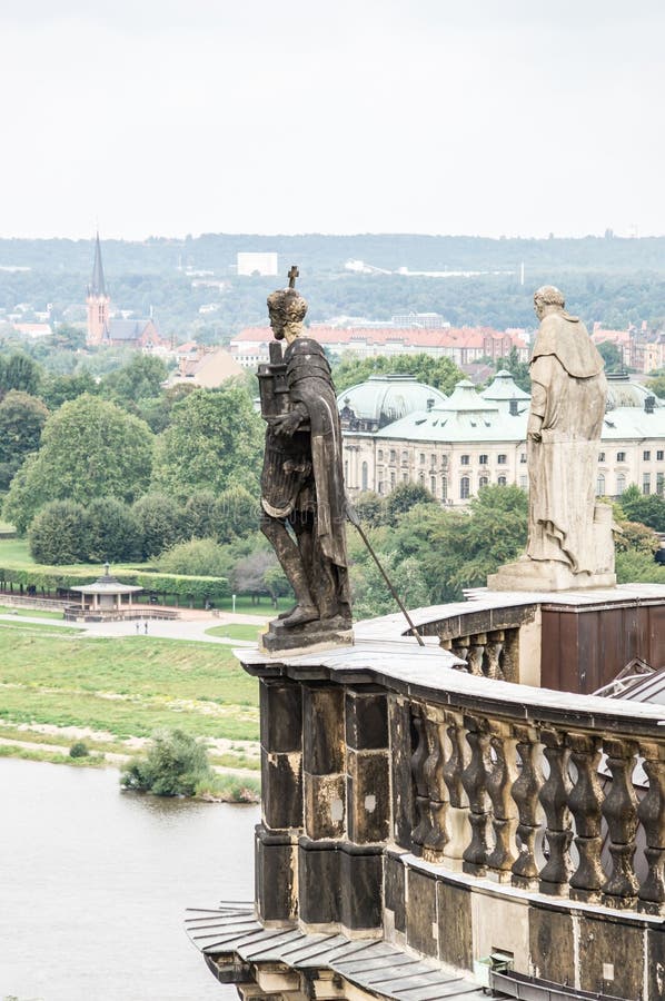 Ornate Bronze Statue Perched Atop a Majestic Building Stock Image ...