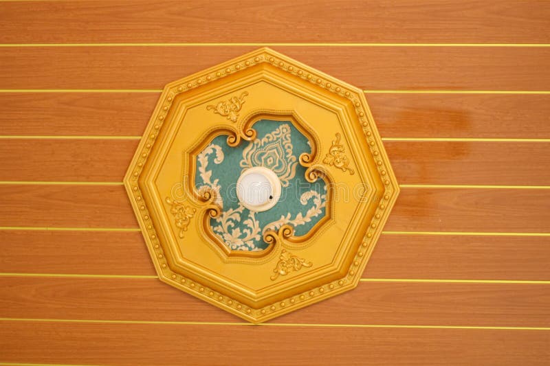An Ornate Ceiling Medallion with an Octagonal Shape Features a Central ...