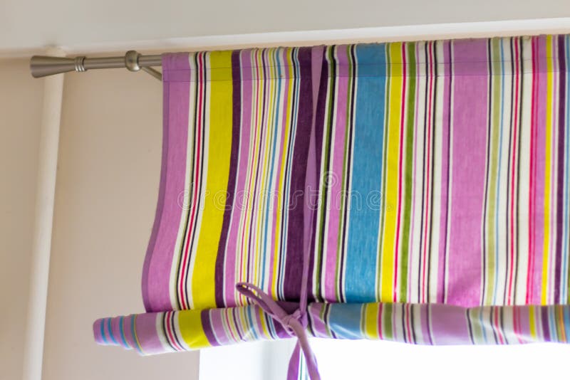 Ornate Colourful Curtain with Lines Covering the Whole Window Stock ... Ornate Colourful Curtain with Lines Covering the Whole Window Stock ...