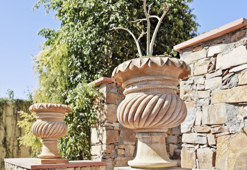 Ornate Flower Clay Pots Feature Stone Wall Stock Image - Image of ...