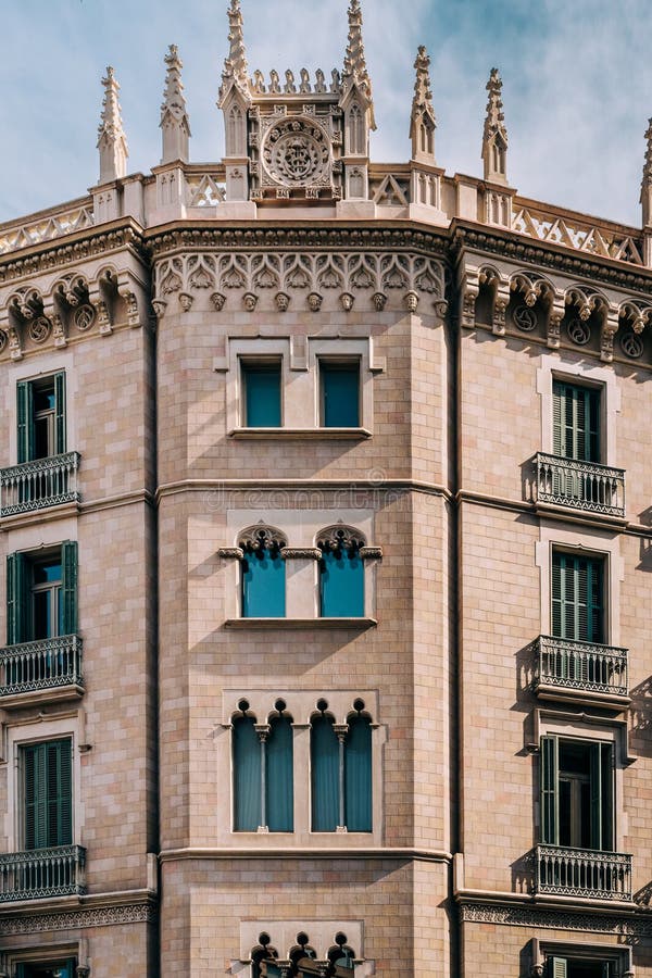 Ornate Gothic Facade of a Historical Building Under Blue Sky in ...