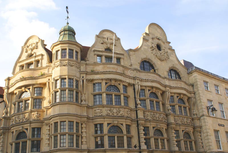 Ornate Sculptural Facade with Columns & Arched Windows Stock Image ...