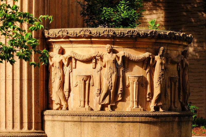 Ornate Stone Carvings of Draped Figures on a Historical Column Stock ...
