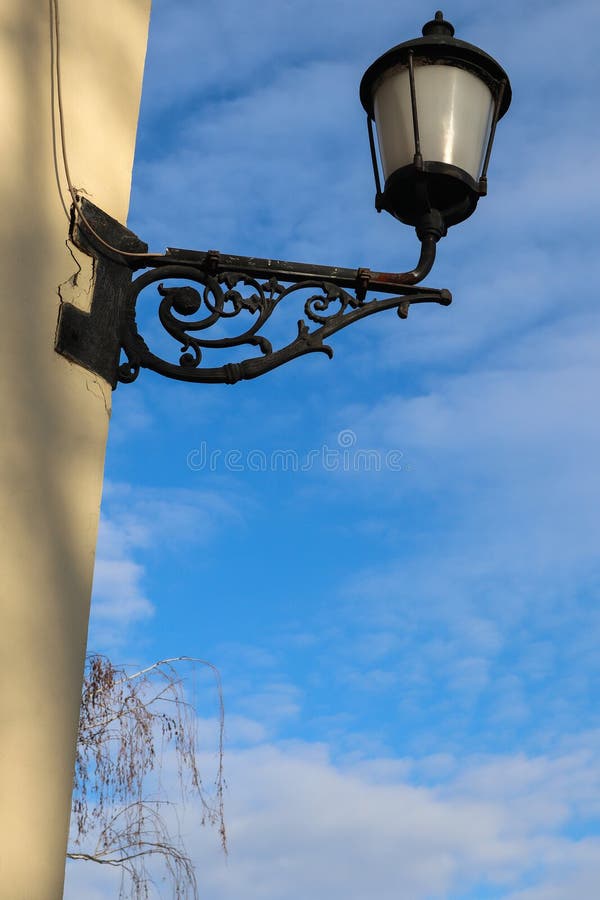 Ornate Street Light on the Wall of a Building Stock Image - Image of ...