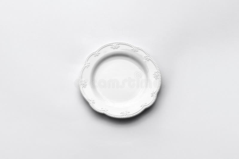 Ornate White Ceramic Plate on Seamless White Background Stock Photo ...