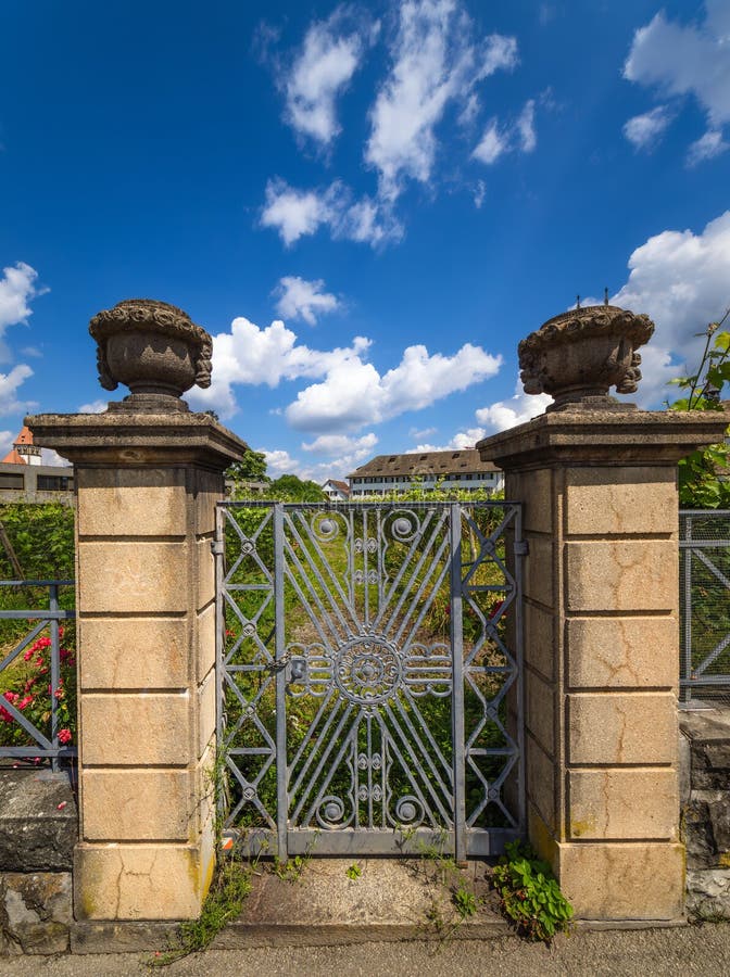Ornate wrought-iron gate stock image. Image of ornamental - 322458991