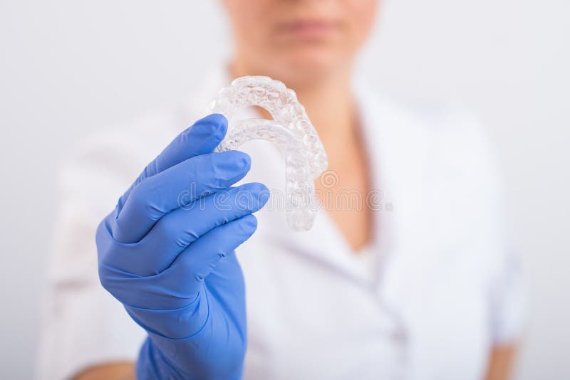 The Orthodontist Holds the Removable Transparent Retainers Stock Image ...