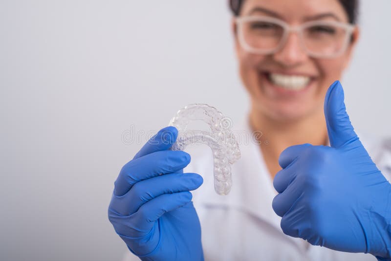 The Orthodontist Holds the Removable Transparent Retainers Stock Image ...