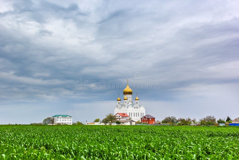 Orthodox Church on the Background of Grain Fields and Thunderclouds ...