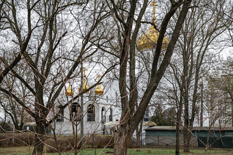 The Orthodox Church is Visible Behind the Leafless Trees of the Park ...
