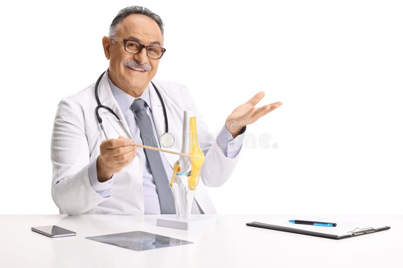 Orthopedic Doctor Pointing at a Knee Bone Model Stock Image - Image of ...