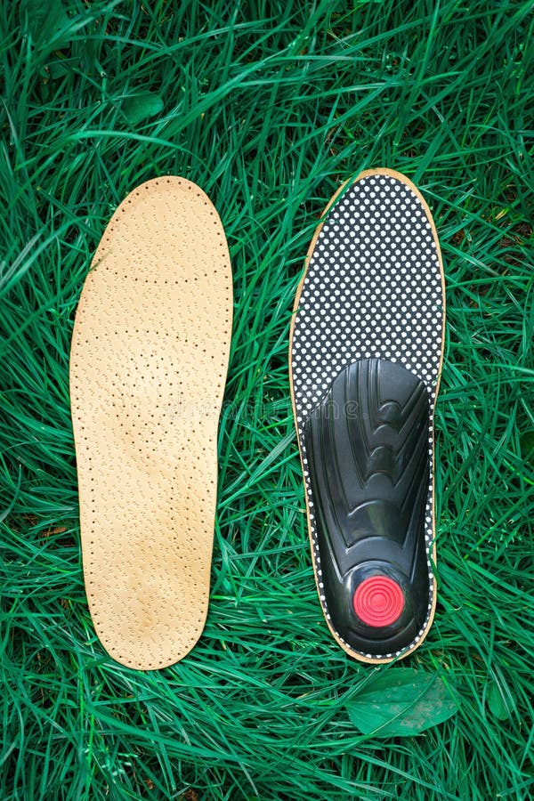Orthopedic Insoles for Shoes on a Background of Green Grass Stock Photo ...