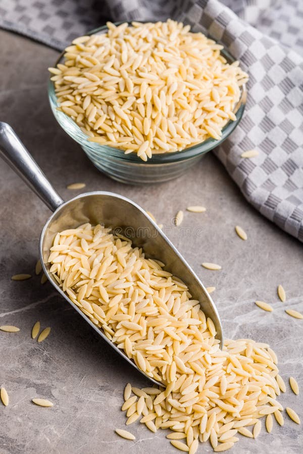 Orzo, Kritharaki, Risoni Pasta. Uncooked Dry Pasta in Scoop on Kitchen ...