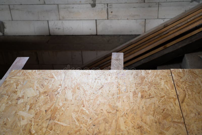 OSB Panel is Laid As a Subfloor. Wood Slab at a Construction Site Close ...