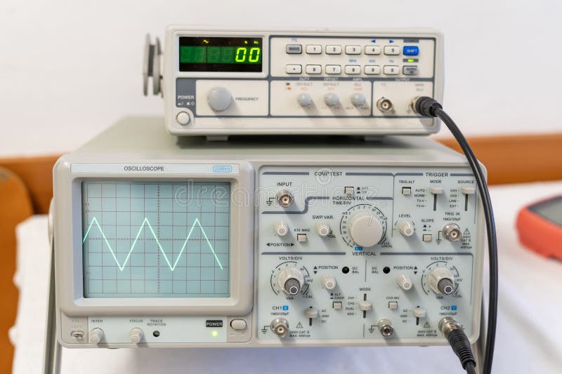Green Sine Waves on the Screen of a Multi-button Oscilloscope Stock ...