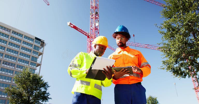 OSHA Inspector at Construction Site Stock Image - Image of holding ...