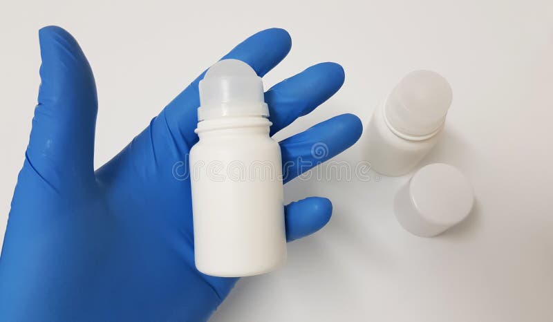 Osmetic Technician Showing a Deodorant and Antiperspirant Rollon ...