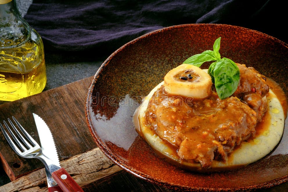 Osso Buko Steak with Juicy Gravy, Mashed Potatoes and Basil Stock Photo ...