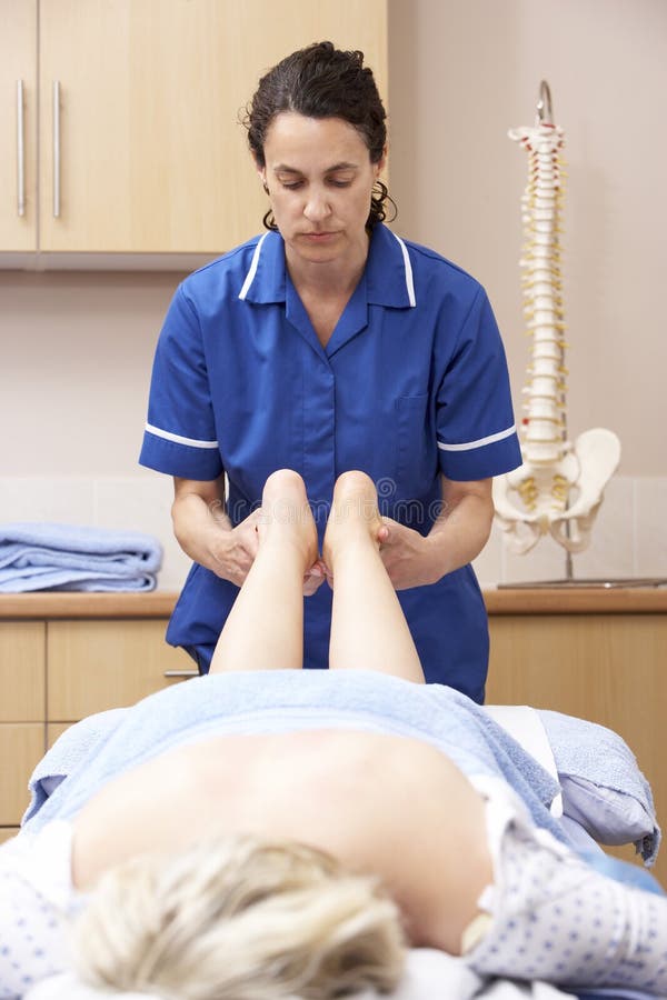 Osteopath Treating Female Client Stock Image - Image of people, patient ...