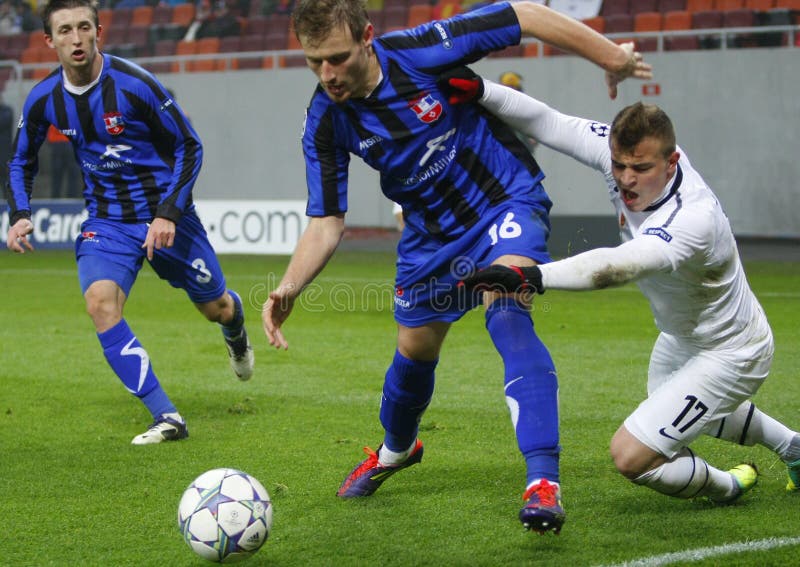 Football Players Fight for the Ball Champions League Game Otelul Galati ...